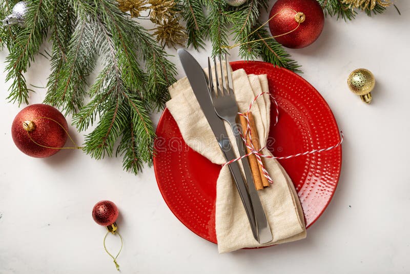 Red Plate and Christmas Decorations Table Setting from Above Stock ...