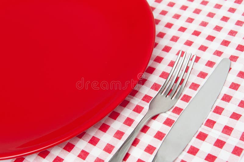 Red plate and cutlery stock photo. Image of design, decorative - 31405494