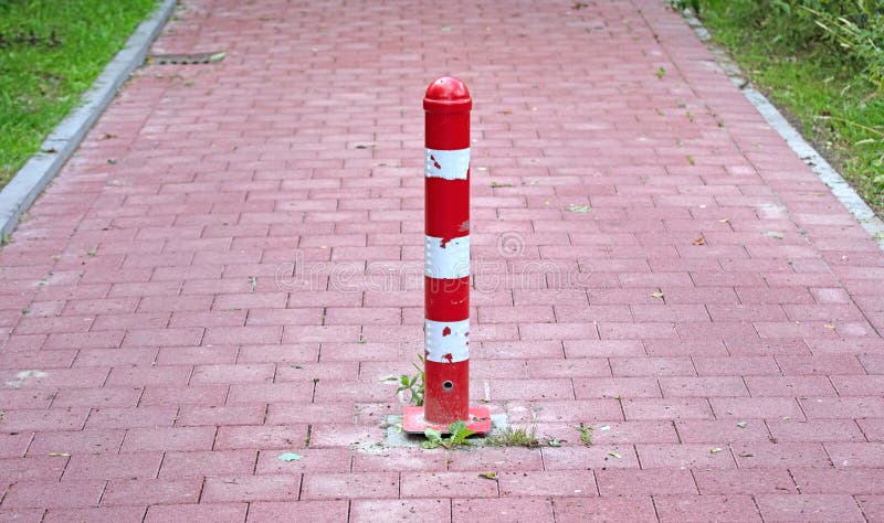 Red Pole in the Middle of a Bicycle Path Stock Image - Image of pole ...