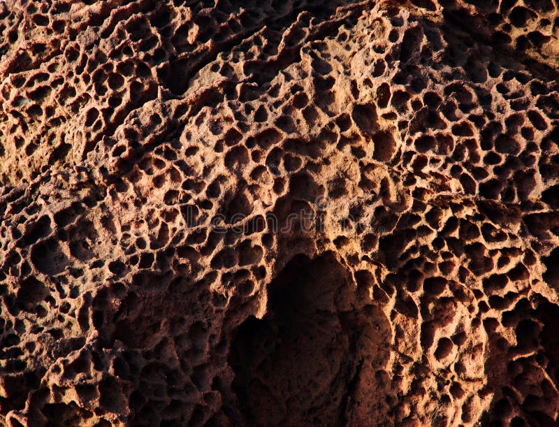 Red porous stone. stock image. Image of brown, water - 28062269