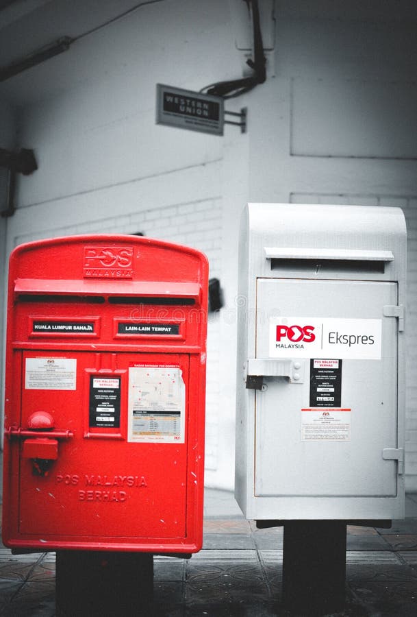 Red Post and Another Post with Red Logo Editorial Stock Image - Image ...