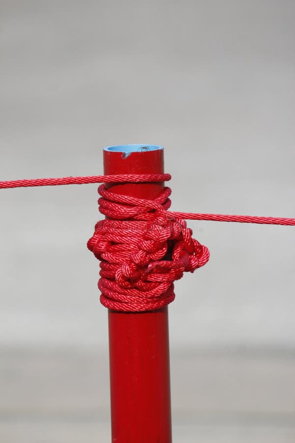 Red post and red rope stock photo. Image of post, pole - 46055278