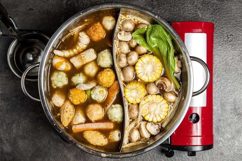 A Red Pot with Two Different Types of Food in it Stock Photo - Image of ...