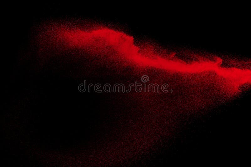 Red Powder Explosion on Black Background. Freeze Motion of Red Dust ...