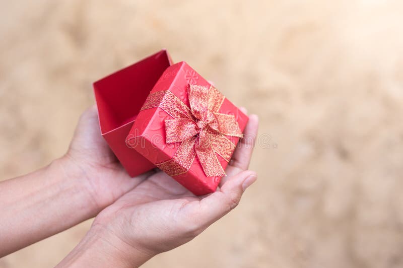 Present box in woman hand stock photo. Image of christmas - 116063634