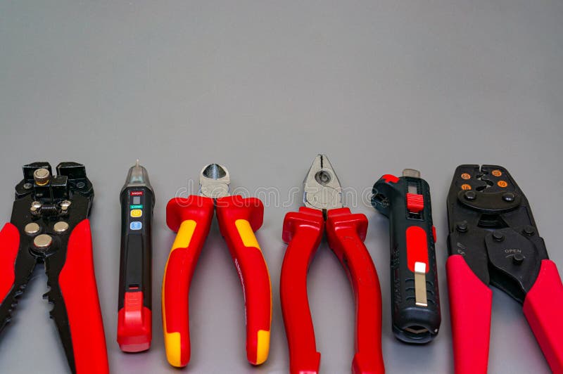 Red Professional Electrician Tools on Silver Background Stock Image ...