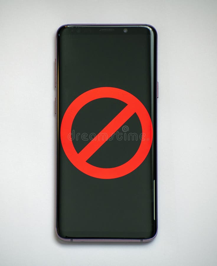 Red Prohibition Sign on the Smartphone Screen Stock Photo - Image of ...