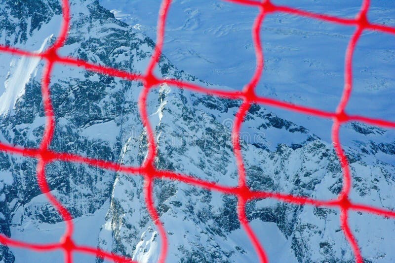 Red Protecting Grid Against the Stock Image - Image of covered ...