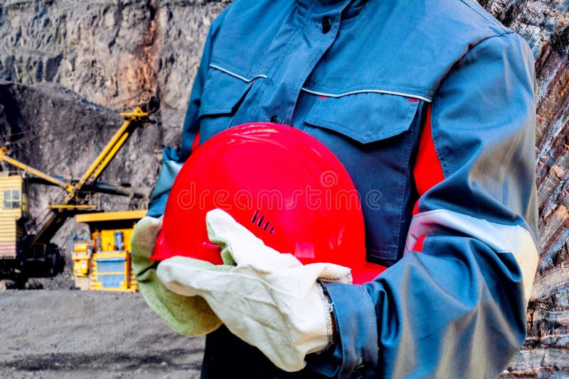 Red Protective Helmet . the Worker in Special Clothes Stock Image ...