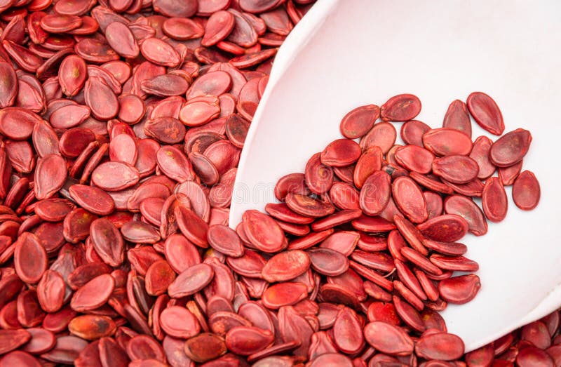 Red Pumpkin Seeds stock photo. Image of scoop, organic - 33758684