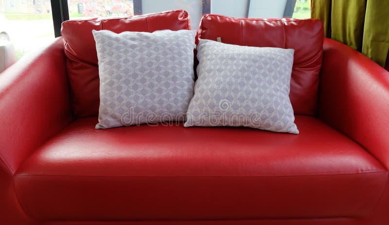 Red PVC upholstery sofa stock photo. Image of interior - 65700410
