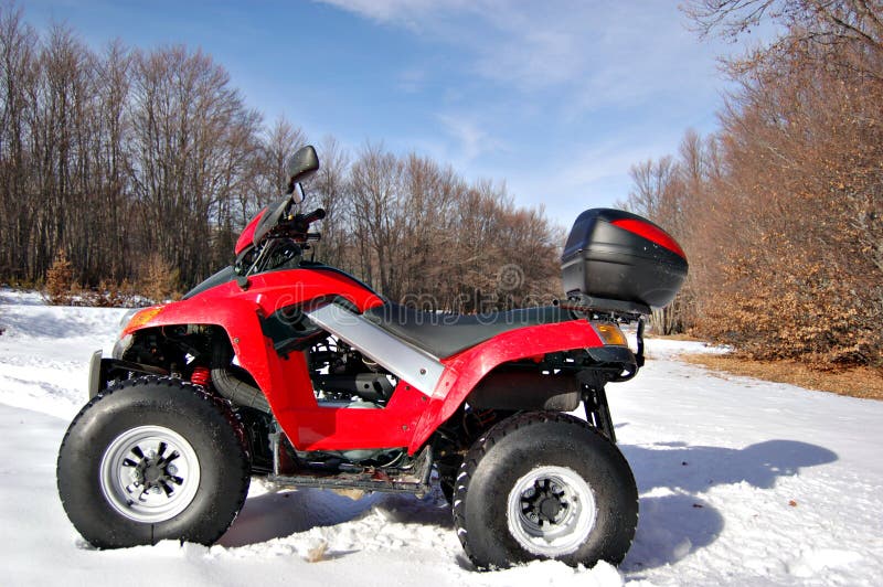 Red quad in snow stock photo. Image of motocross, motor - 3897726