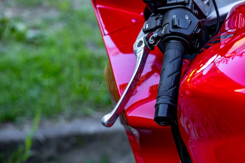 Red Racing Motorcycle, Close-up of the Clutch and Throttle Grip on ...
