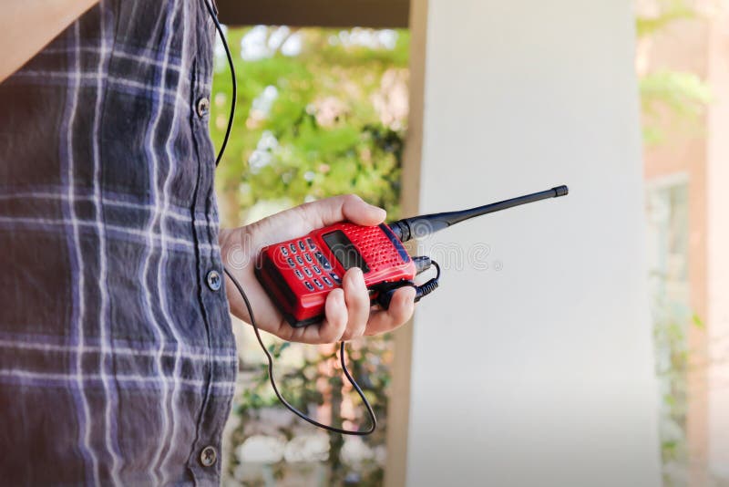 Red Radio Communication on Working Women Hand Stock Photo - Image of ...