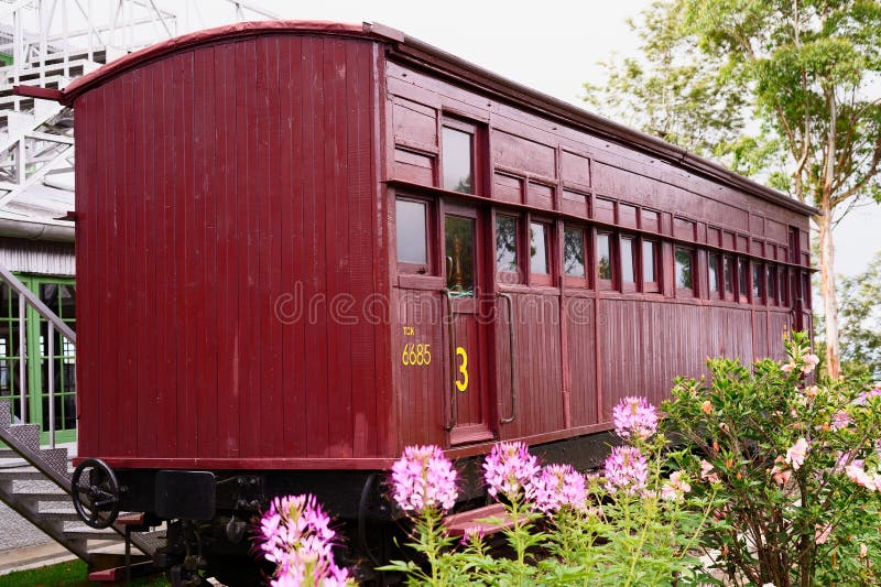 Red Railway Carriage between Flowers Stock Photo - Image of carriage ...