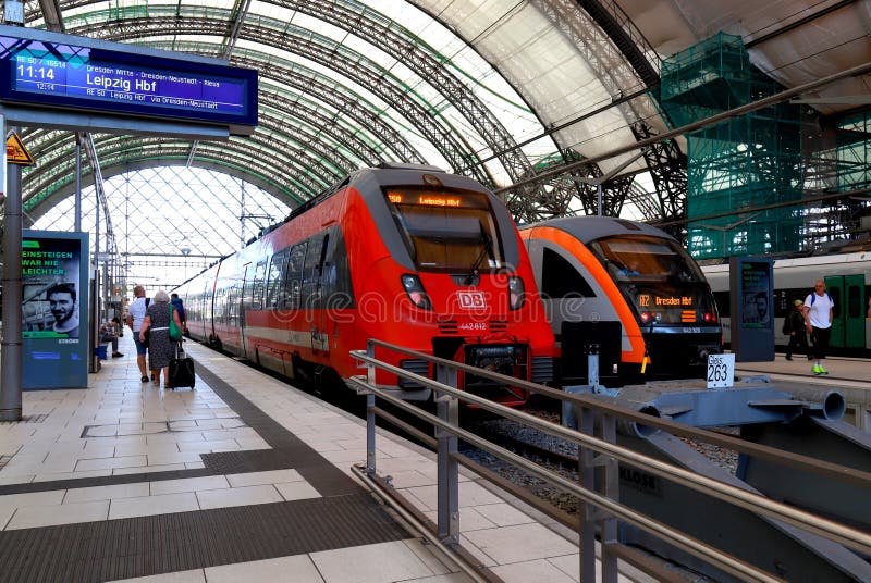 Red Railway Wagon Train. a Modern High Speed Train Stands at Dresden ...
