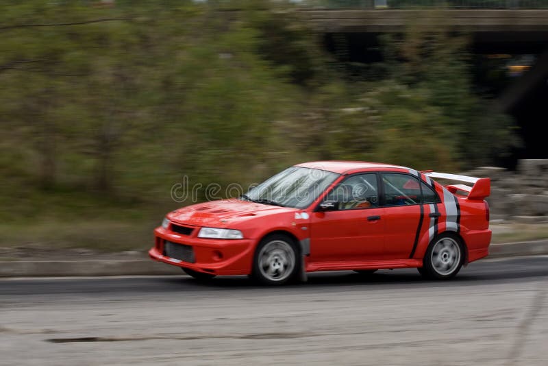 Red rally car stock image. Image of late, commuting, luxury - 8865199