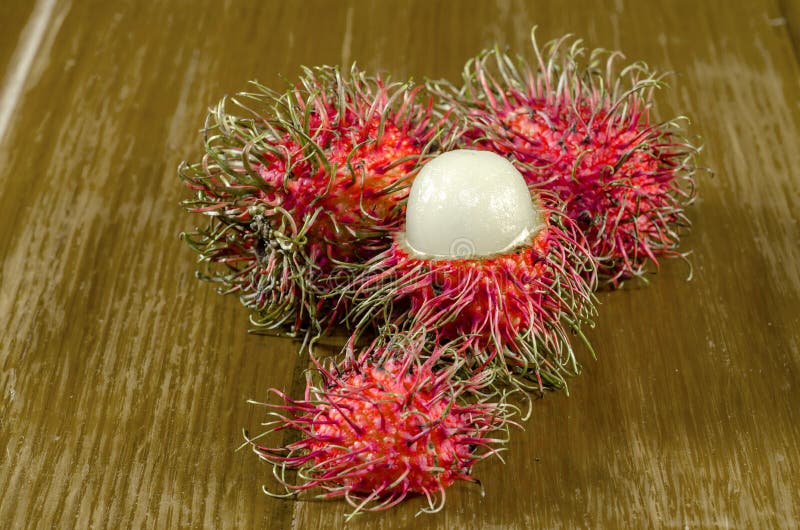 Red Rambutan and Half Peeled Rambutan Stock Image - Image of texture ...