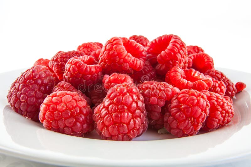 Red Raspberries on White Plate Stock Image - Image of raspberry ...