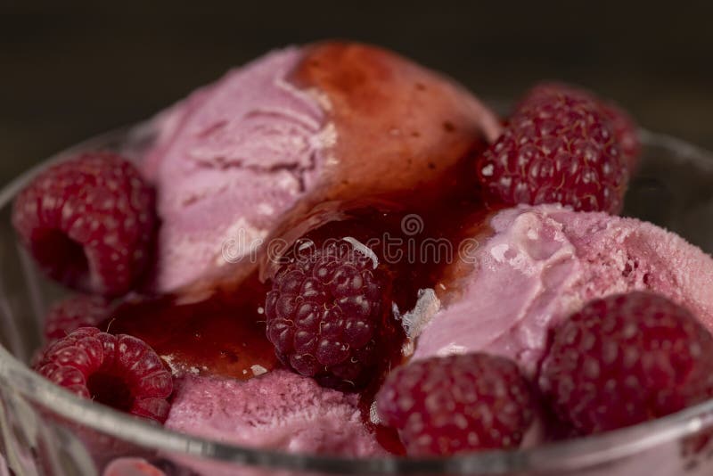 Red Raspberry Ice Cream in a Glass Bowl with Raspberry Jam Stock Image ...