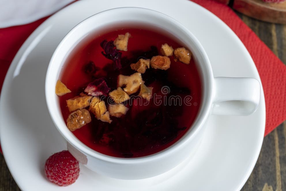 Red Raspberry Tea with Pieces of Fruit and Berries Stock Image - Image ...