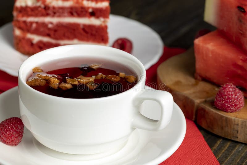 Red Raspberry Tea with Pieces of Fruit and Berries Stock Photo - Image ...