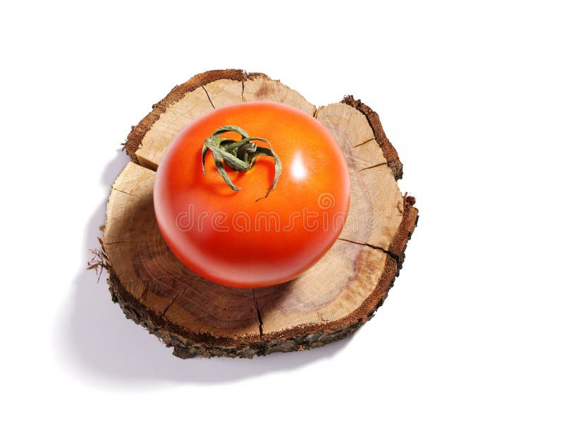 Tomato on circle wood. stock image. Image of tasty, energy - 145640615