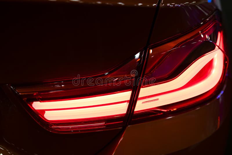 Red Rear Light on a Modern Red Car with Reflection. the Closeup Stock ...