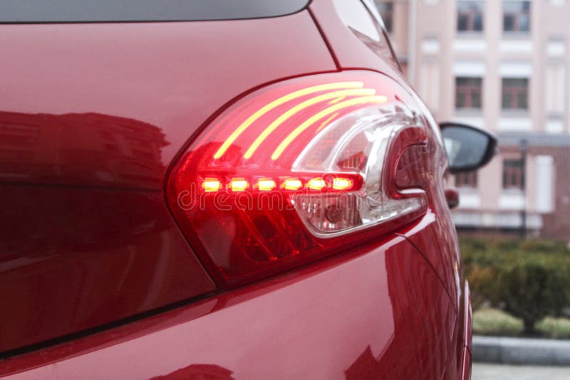 Red Rear Stop Light of a Red Car is on Stock Photo - Image of ...