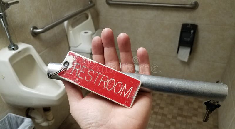 Red Restroom Key Tag and Toilets in Bathroom Stock Photo - Image of ...