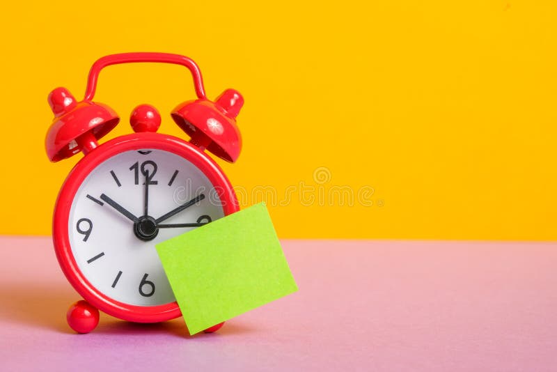 Red Retro Clock on Yellow Background. Green Sticker for Text. Stock ...