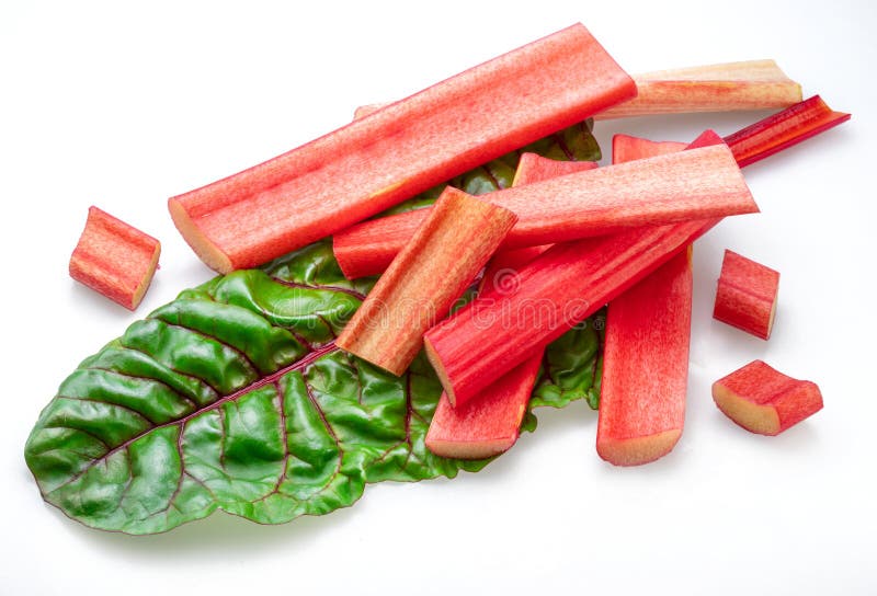 Red Rhubarb Stems Cuts Over Rhubarb Leaves Isolated on White Background ...