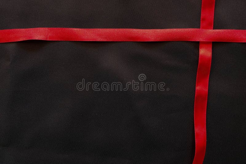 Red Ribbon on Black Silk Cotton Background Stock Photo - Image of ...