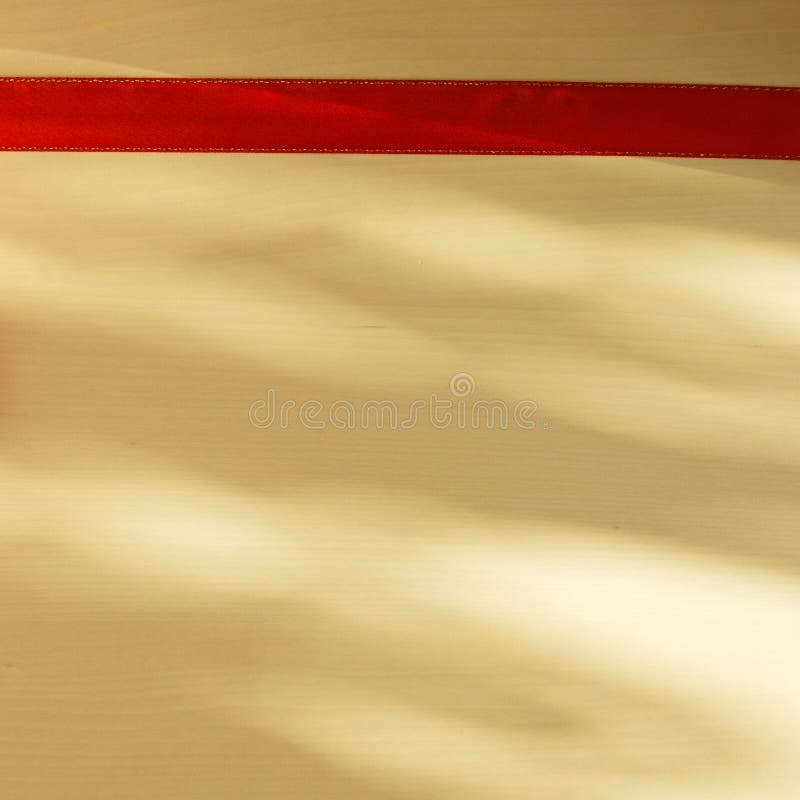 Red Ribbon on Bright Wooden Surface with Copy Space. Stock Image ...