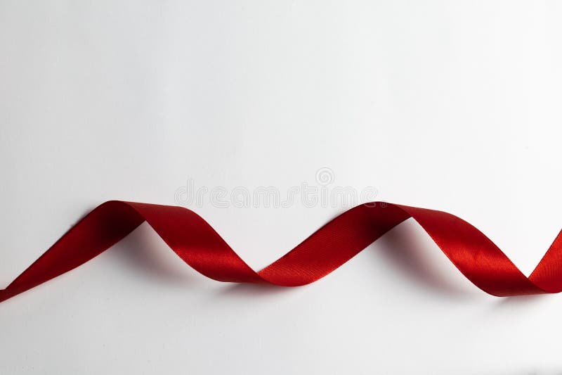 The Red Ribbon is Folded in a Spiral. Stock Image - Image of party ...