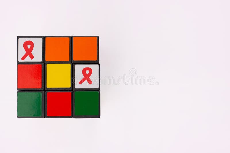 Red Ribbon HIV, AIDS on Rubik S Cube, Awareness, Top View Stock Photo ...