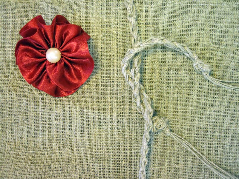 Red ribbon on linen fabric stock photo. Image of ribbon - 36638298