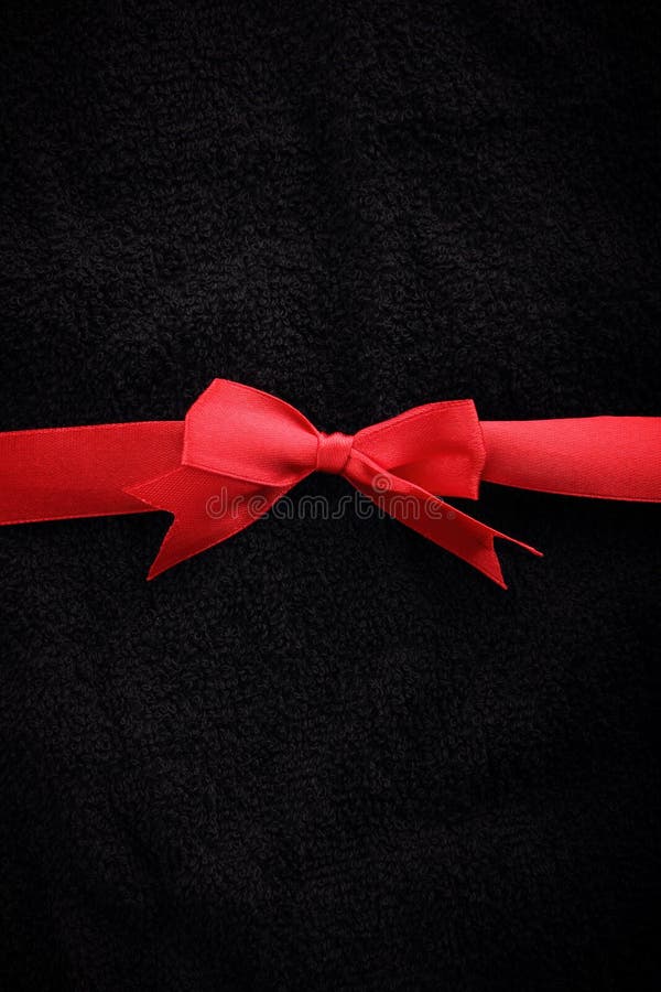 Red ribbon over black stock photo. Image of celebration - 63221984