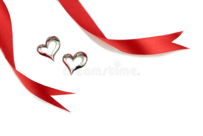 Red Ribbon and Silver Hearts Stock Photo - Image of package, ribbon ...