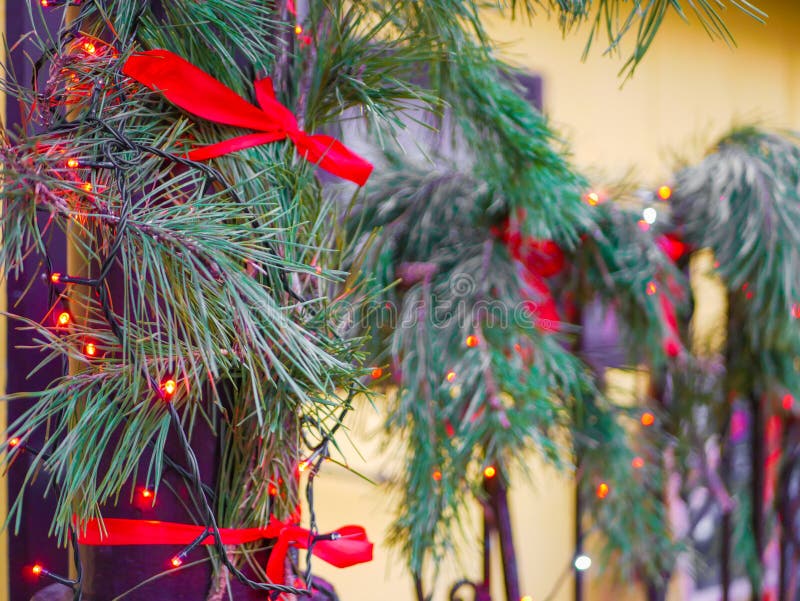 Red ribbons on pine tree stock image. Image of greeting - 195189121