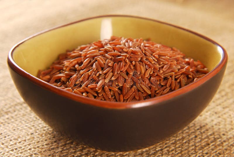 Red Rice in Bowl on Hessian Stock Photo - Image of cereal, fabric: 45980966