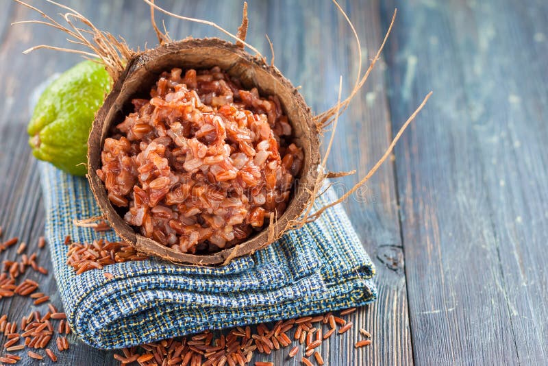 Red Rice with Coconut Milk and Lime Stock Photo - Image of favorite ...