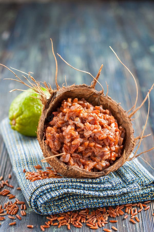 Red Rice with Coconut Milk and Lime Stock Photo - Image of boiling ...
