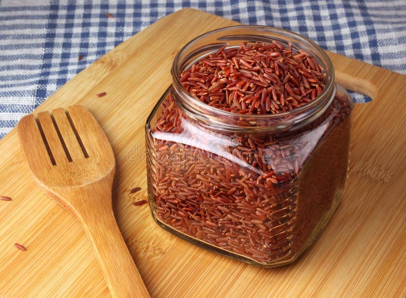 Red Rice in a Glass Jar on the Table. Stock Photo - Image of diet ...