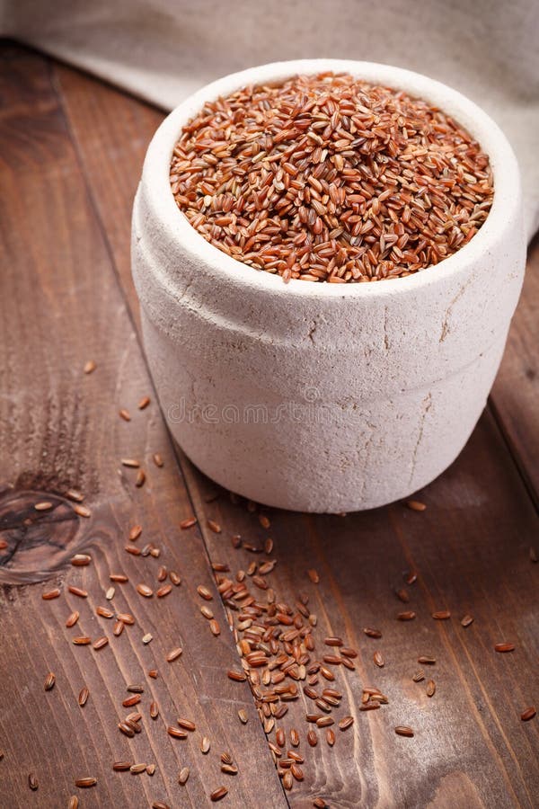 Red rice stock image. Image of ingredient, asia, bowl - 40267807