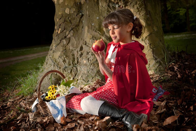 Red riding hood with apple stock image. Image of forest - 9529079