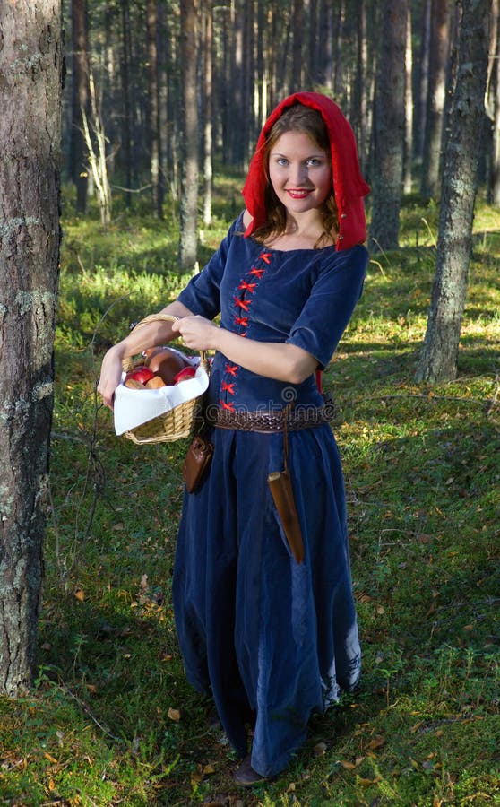 Red Riding Hood Standing in a Wood Stock Photo - Image of fable, dress ...