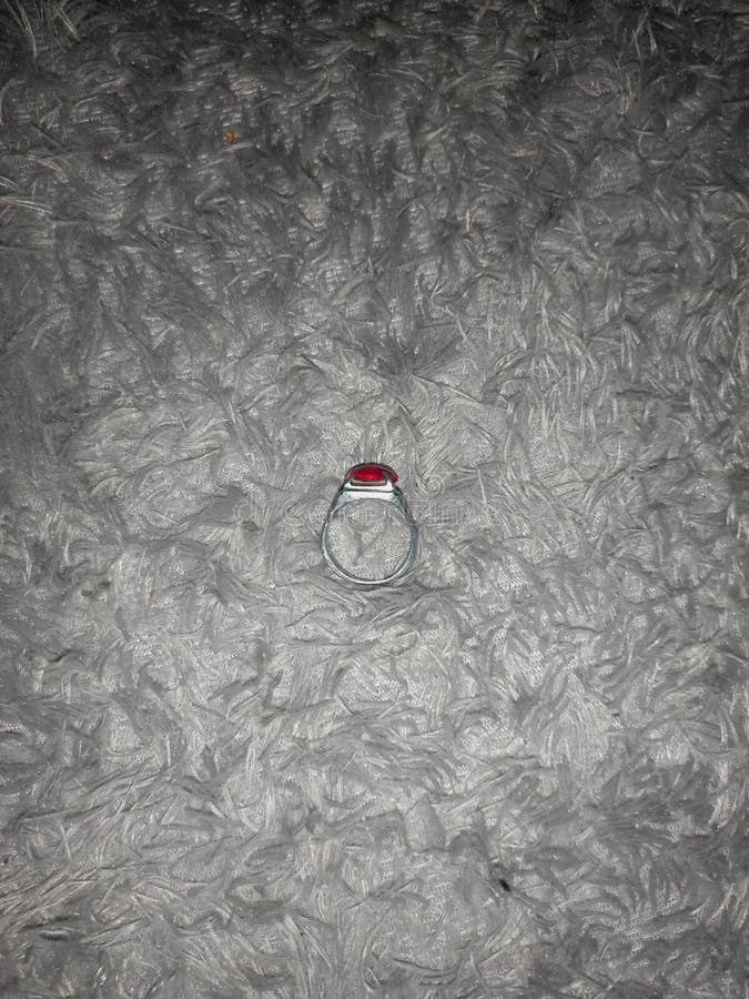 Red ring on carpet stock image. Image of caep, carpet - 264096491
