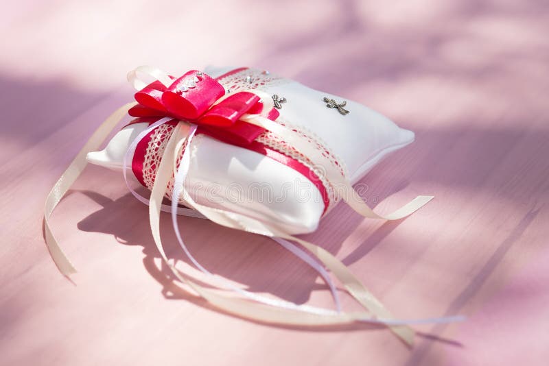 Red Rings Cushion on Table with Ribbons. Wedding Stock Photo - Image of ...