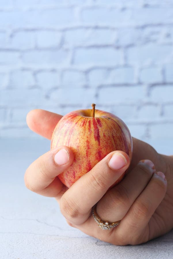 Red Ripe Apple on Women Hand, Isolated on White . Stock Image - Image ...